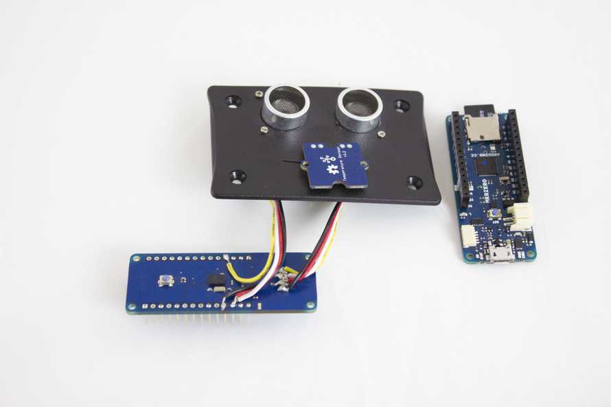 The ultrasound and the temperature sensors are connected with soldered ...